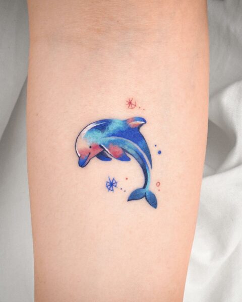 30 Delightful Dolphin Tattoo Ideas for Men & Women in 2024