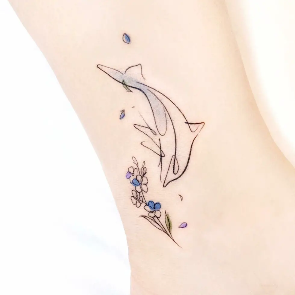 30 Delightful Dolphin Tattoo Ideas for Men & Women in 2024