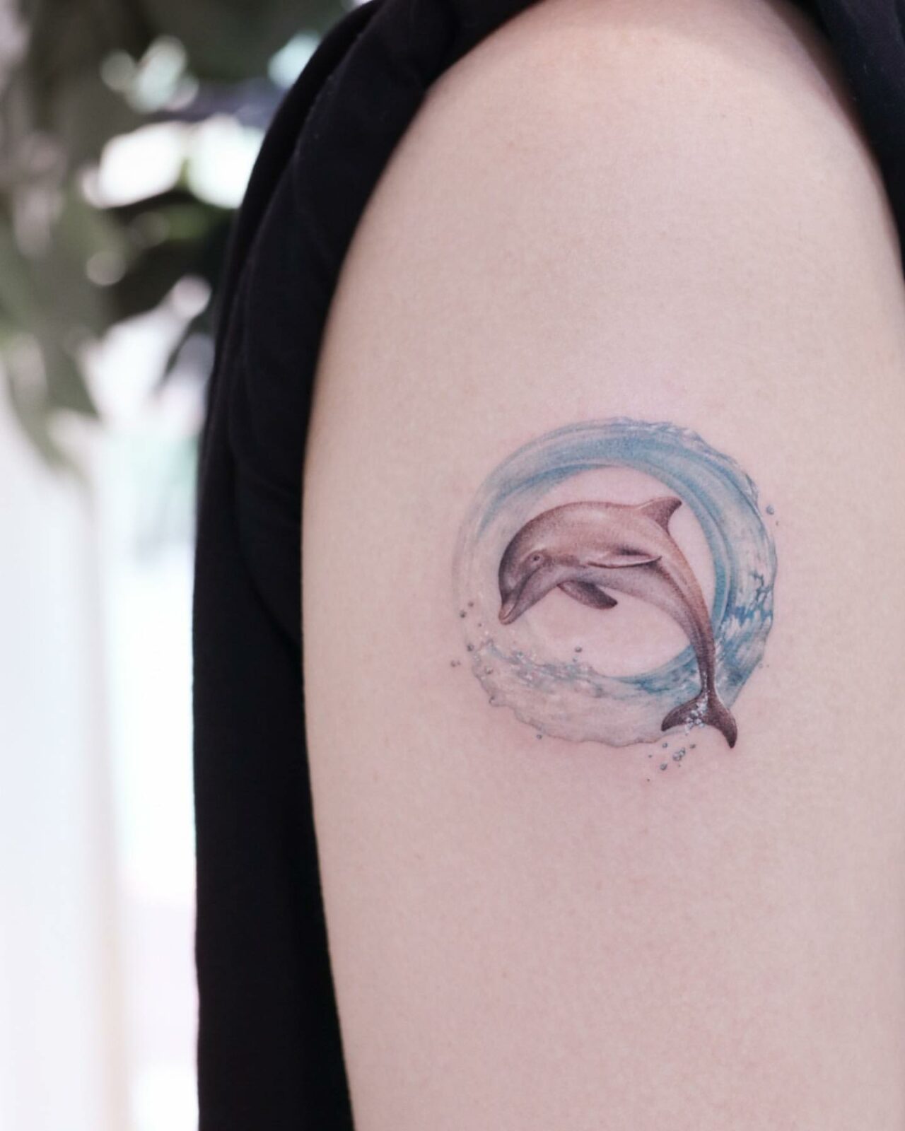 30 Delightful Dolphin Tattoo Ideas for Men & Women in 2024