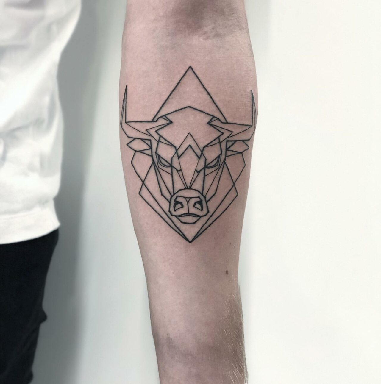 25 Stunning and Daring Bull Tattoo Ideas for Men & Women in 2024