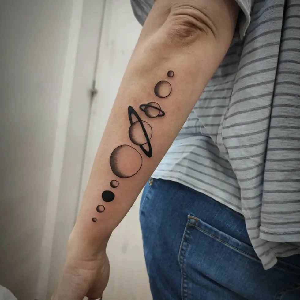 30+ Breathtaking Planet Tattoo Ideas for Men & Women in 2024