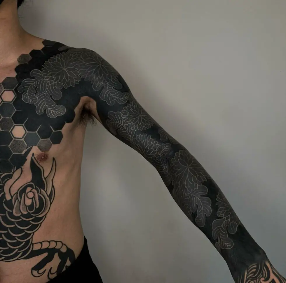 33 Breathtaking Blackout Tattoo Ideas for Men & Women in 2024