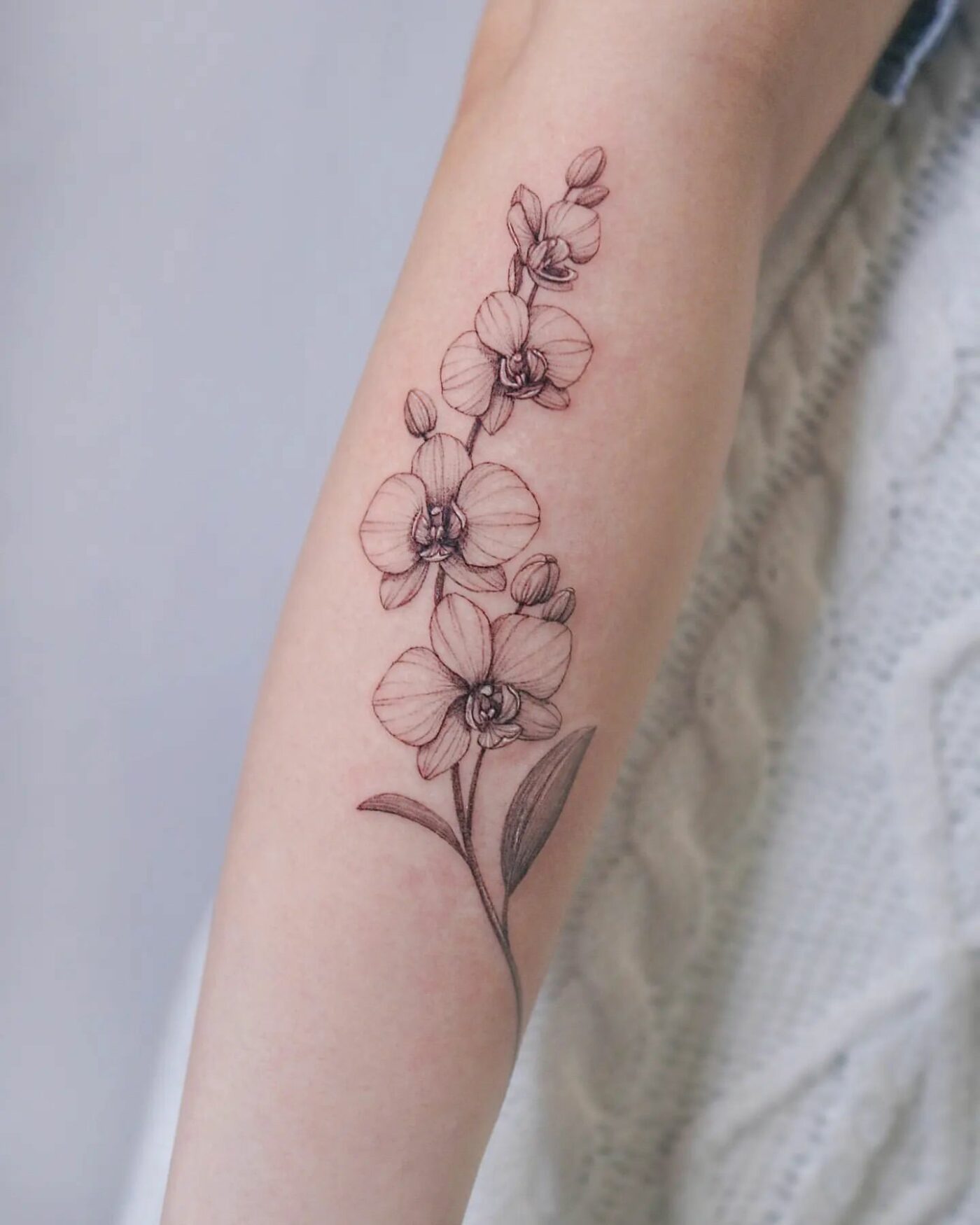 33 Gorgeous Orchid Tattoo Ideas to Inspire You in 2023