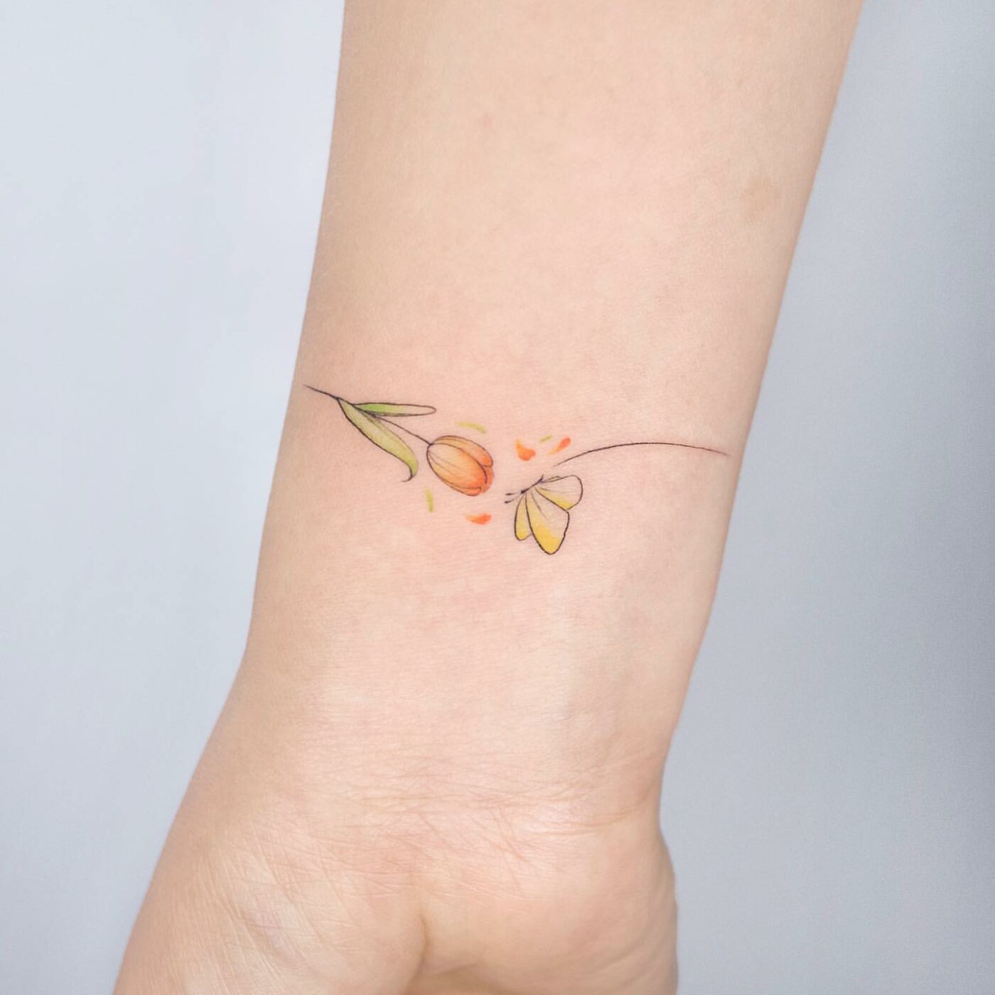 31 Refreshing Tulip Tattoo Ideas To Inspire You in 2023