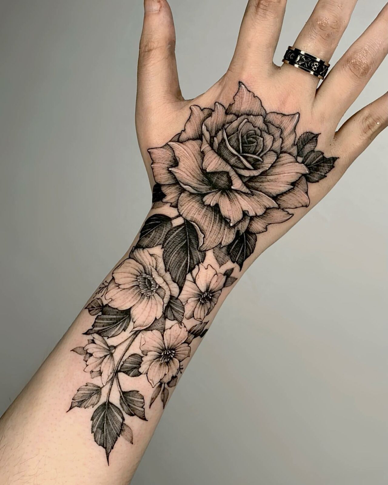 25 Bold and Beautiful Rose Hand Tattoos to Inspire You