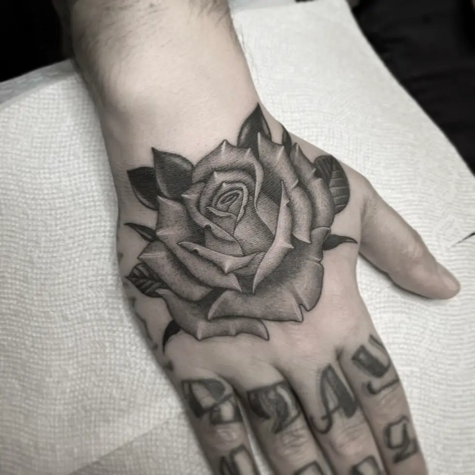 25 Bold and Beautiful Rose Hand Tattoos to Inspire You