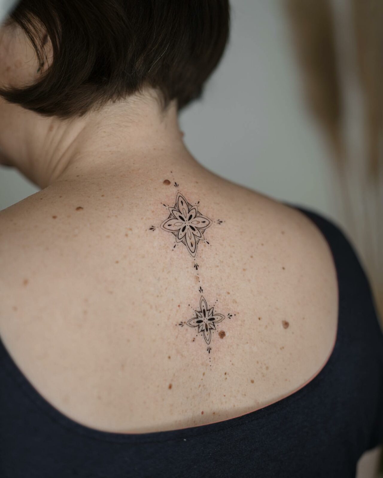 34 Feminine Back Tattoo Ideas for Women in 2024