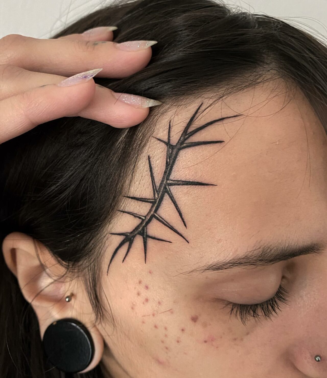 33 Phenomenal Face Tattoo Ideas for Women & Men in 2023