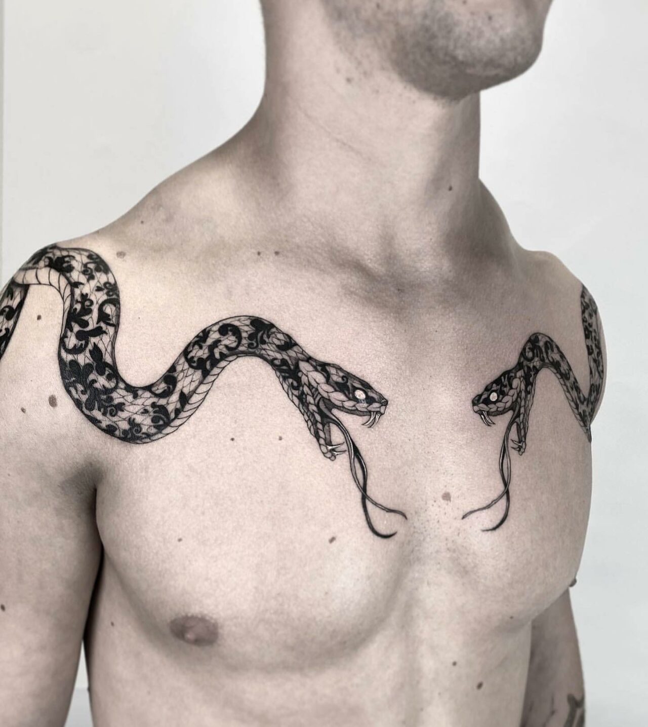 33 Cool Chest Tattoo Ideas for Men in 2024