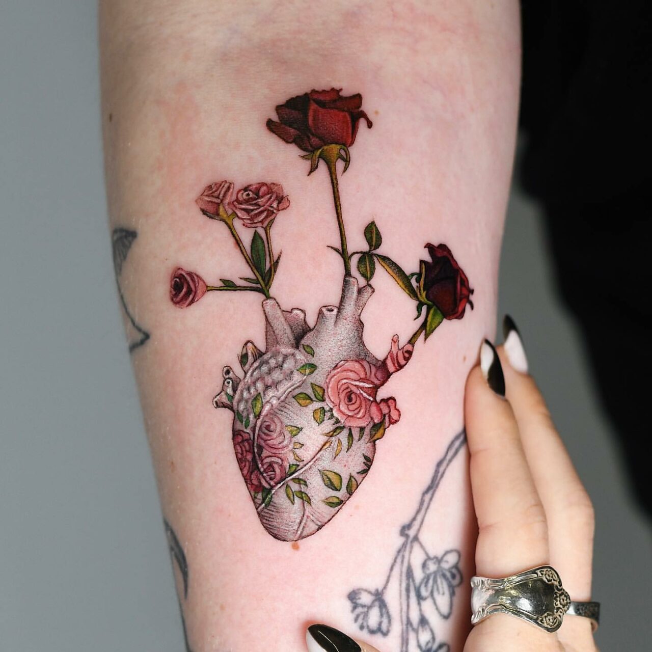 31 Hypnotic Heart Tattoo Ideas for Women in 2023