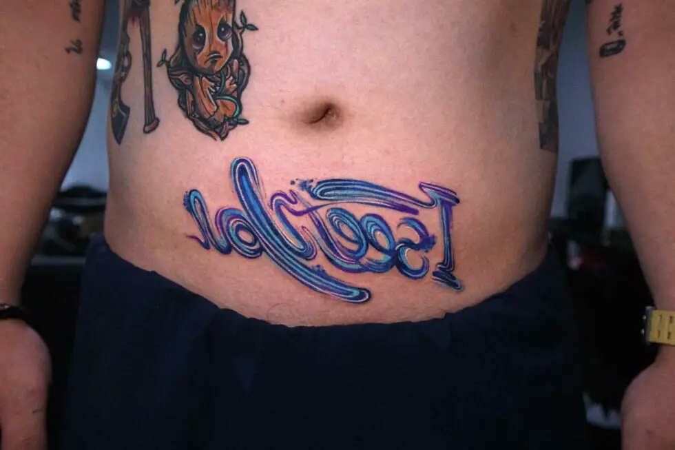 28 Sensational Stomach Tattoo Ideas for Men & Women in 2024