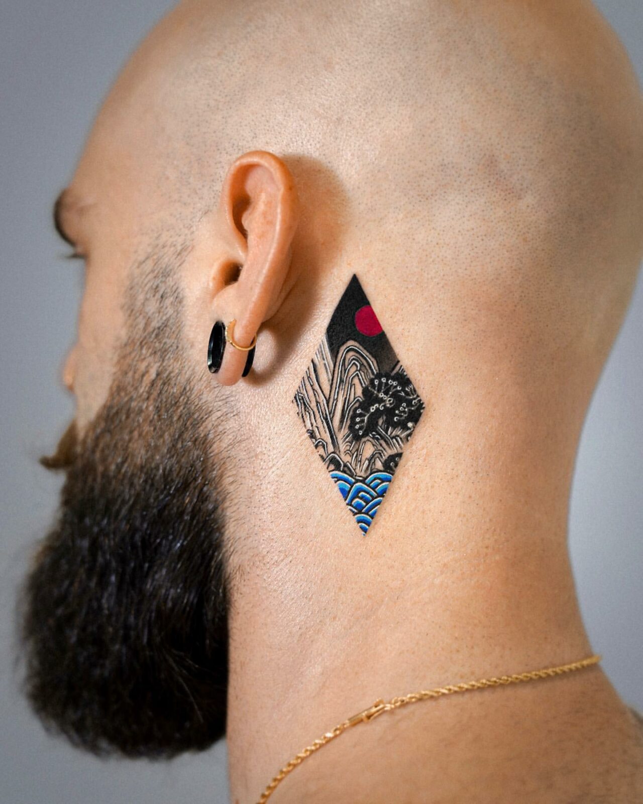 33 Meaningful Small Tattoos for Men in 2024