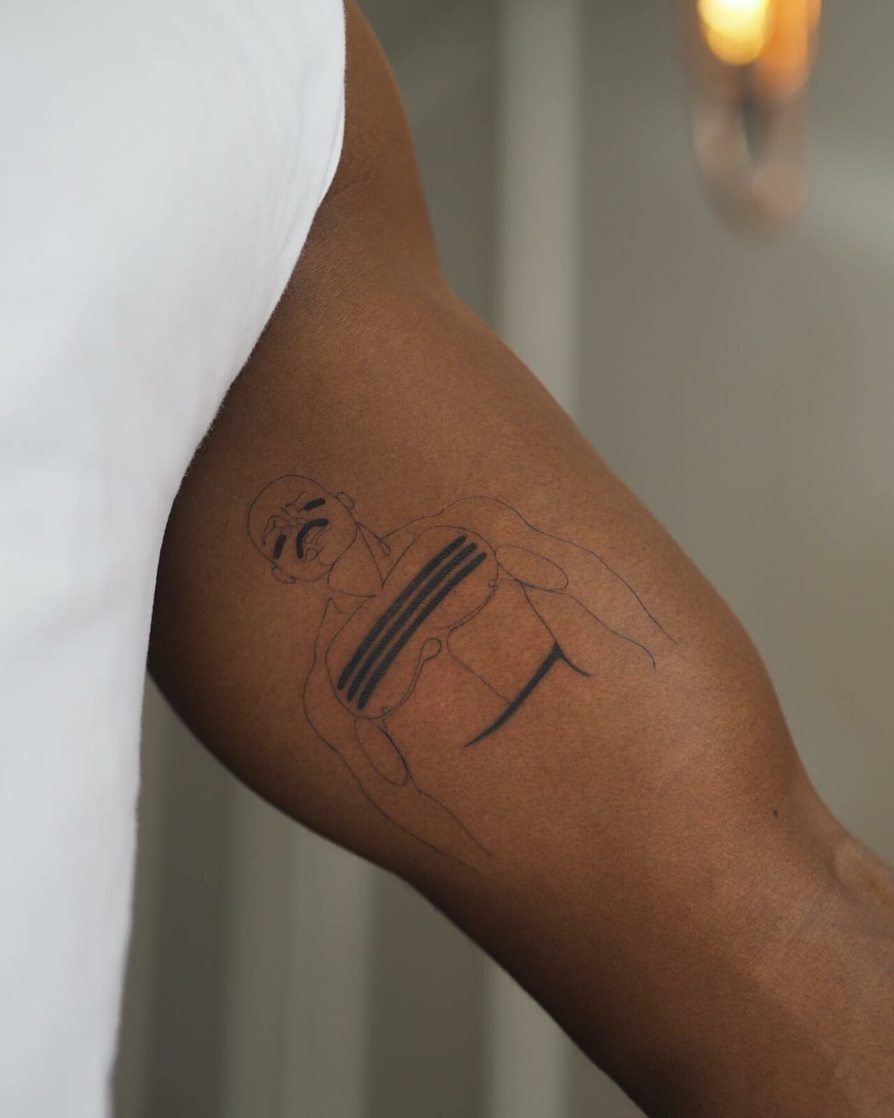 33 Brilliant Bicep Tattoos for Men in 2024
