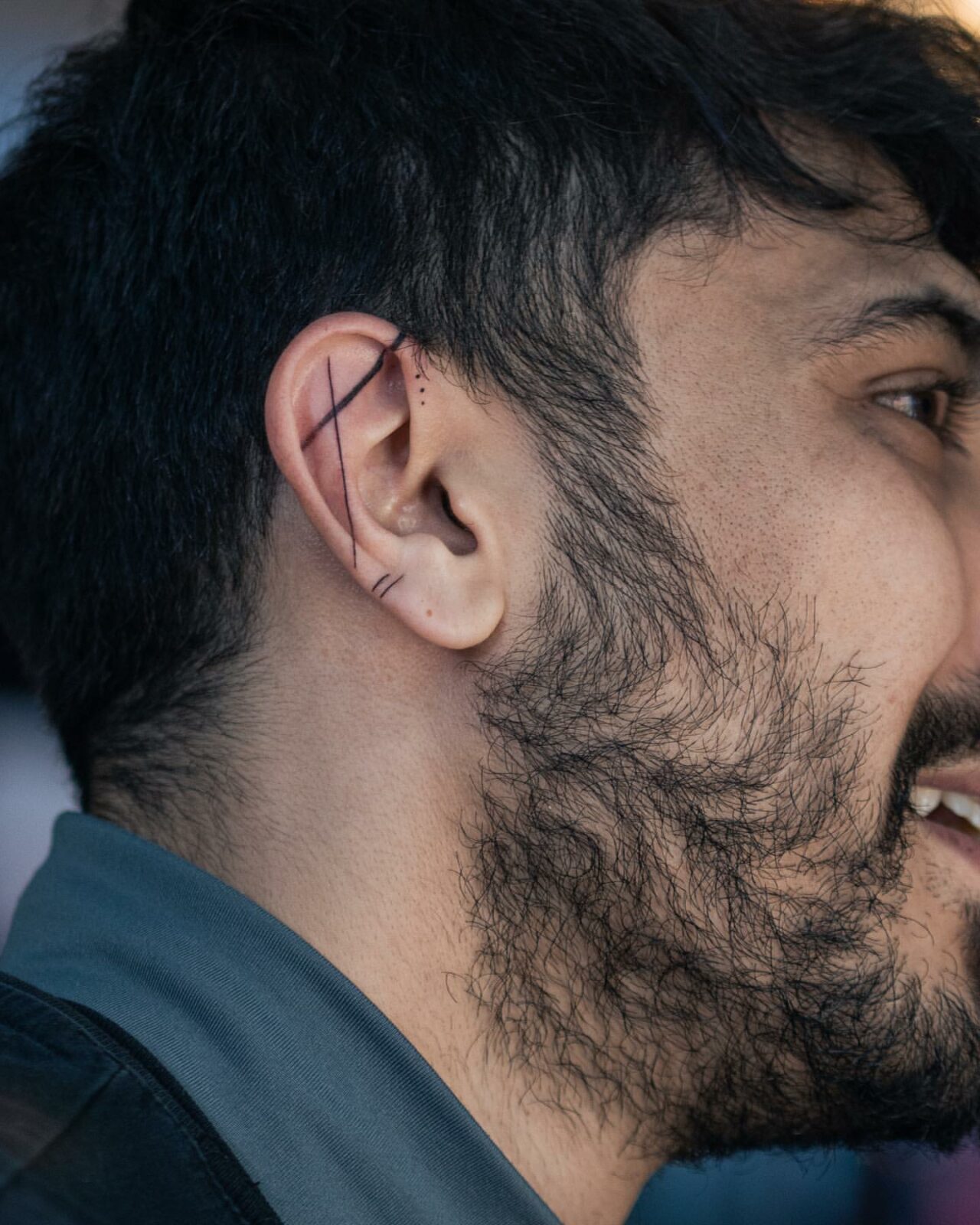 33 Meaningful Small Tattoos for Men in 2024