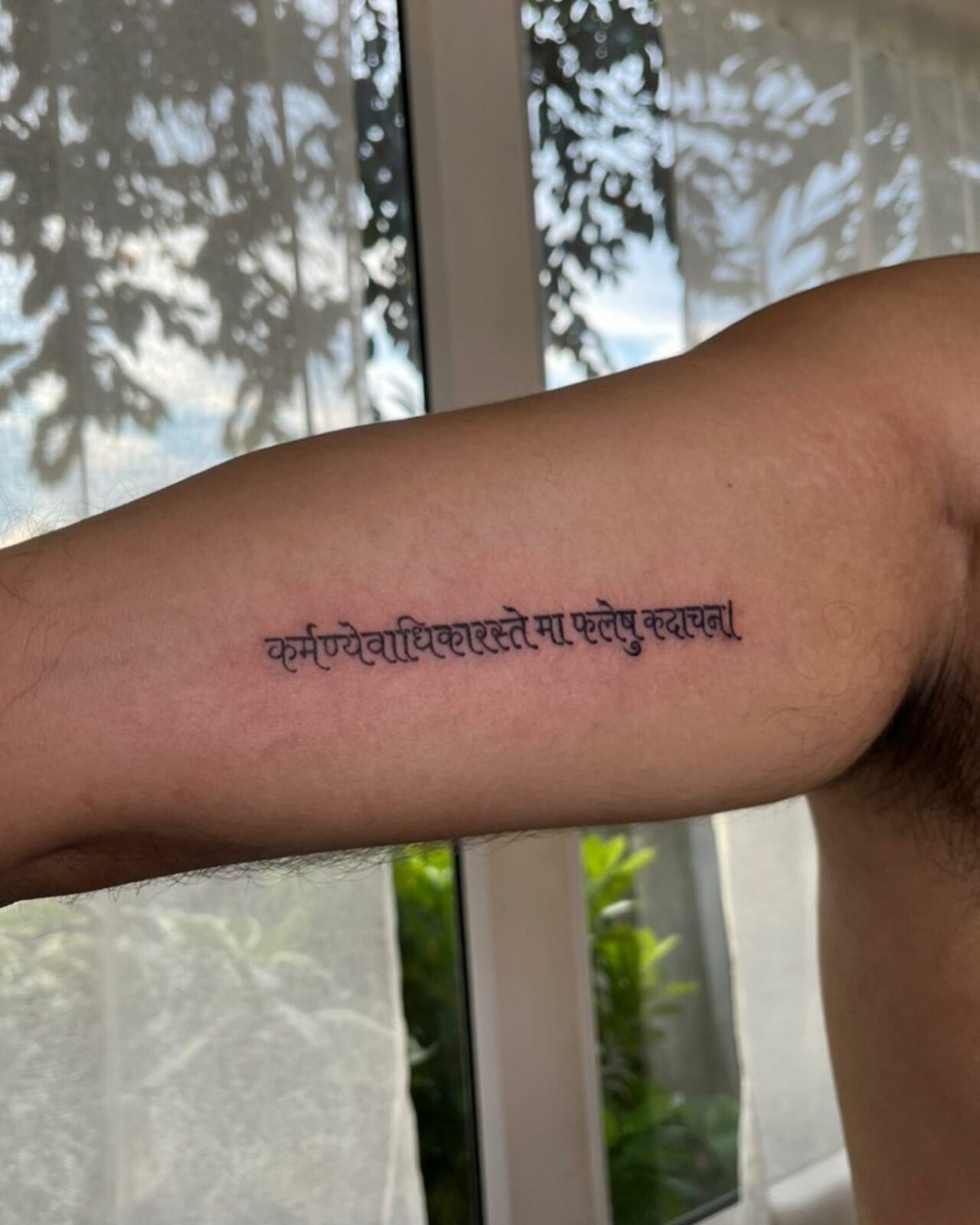 33 Brilliant Bicep Tattoos for Men in 2024