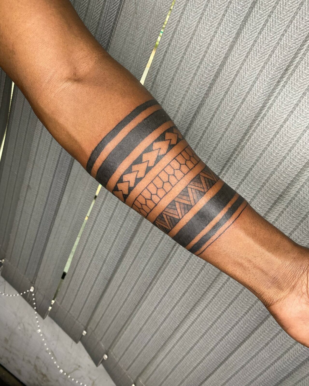 33 Outstanding Forearm Tattoos for Black Men in 2024