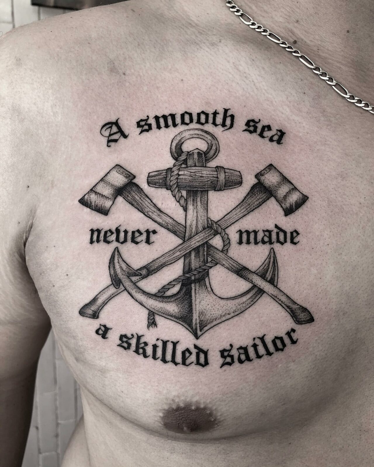 33 Striking Ax Tattoos for Men in 2024