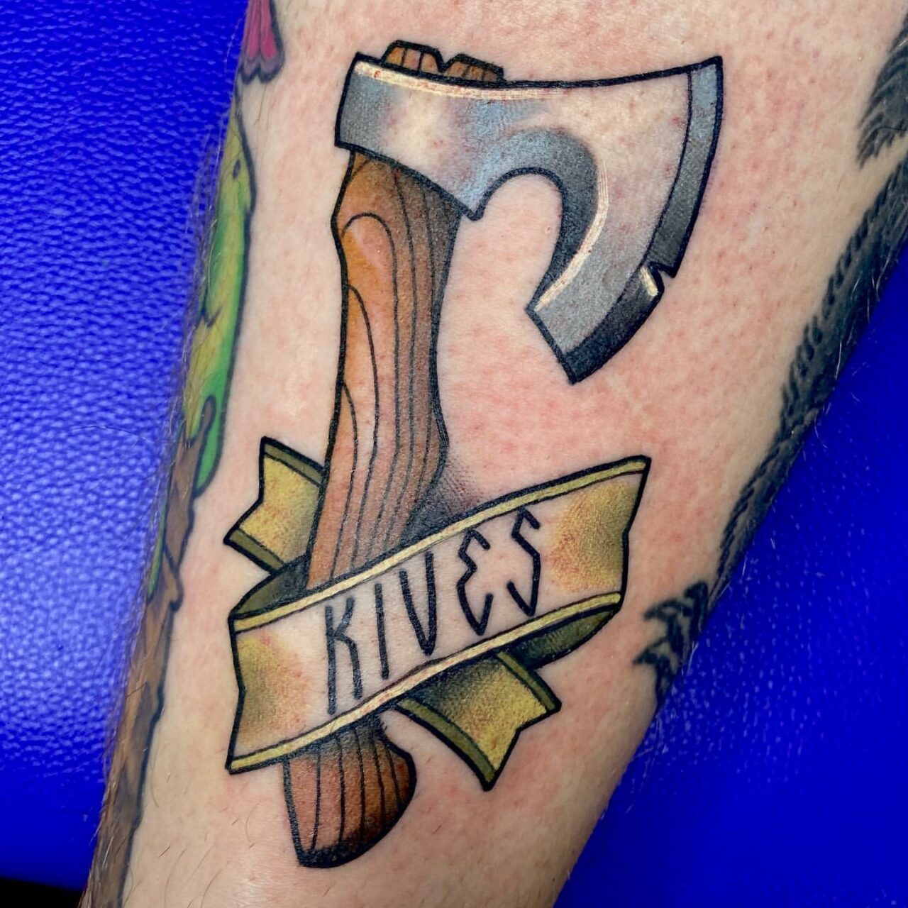 33 Striking Ax Tattoos for Men in 2024
