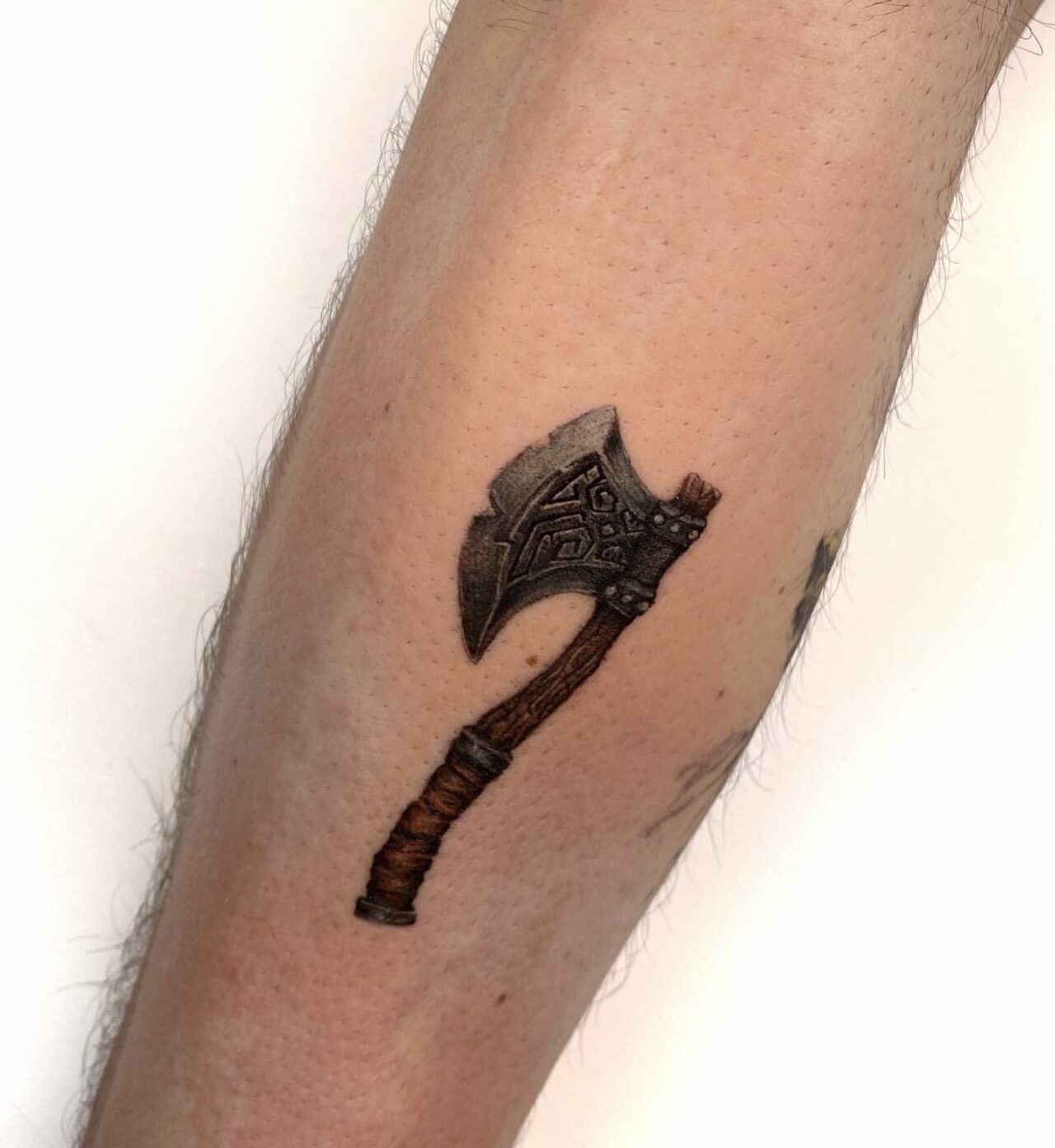 33 Striking Ax Tattoos for Men in 2024