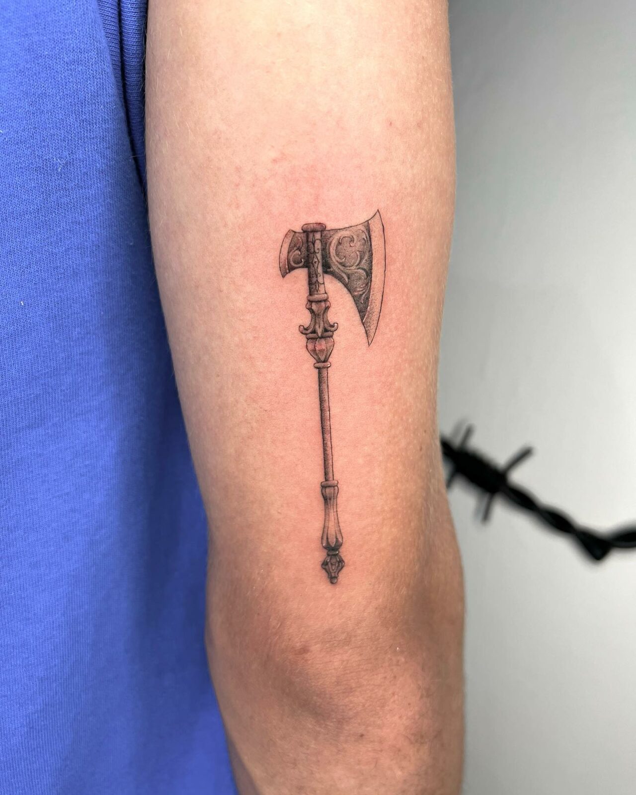 33 Striking Ax Tattoos for Men in 2024